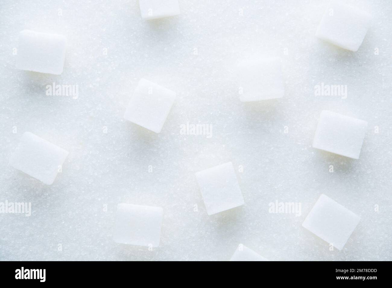 A stack of sugar cubes on a sugary surface Stock Photo - Alamy