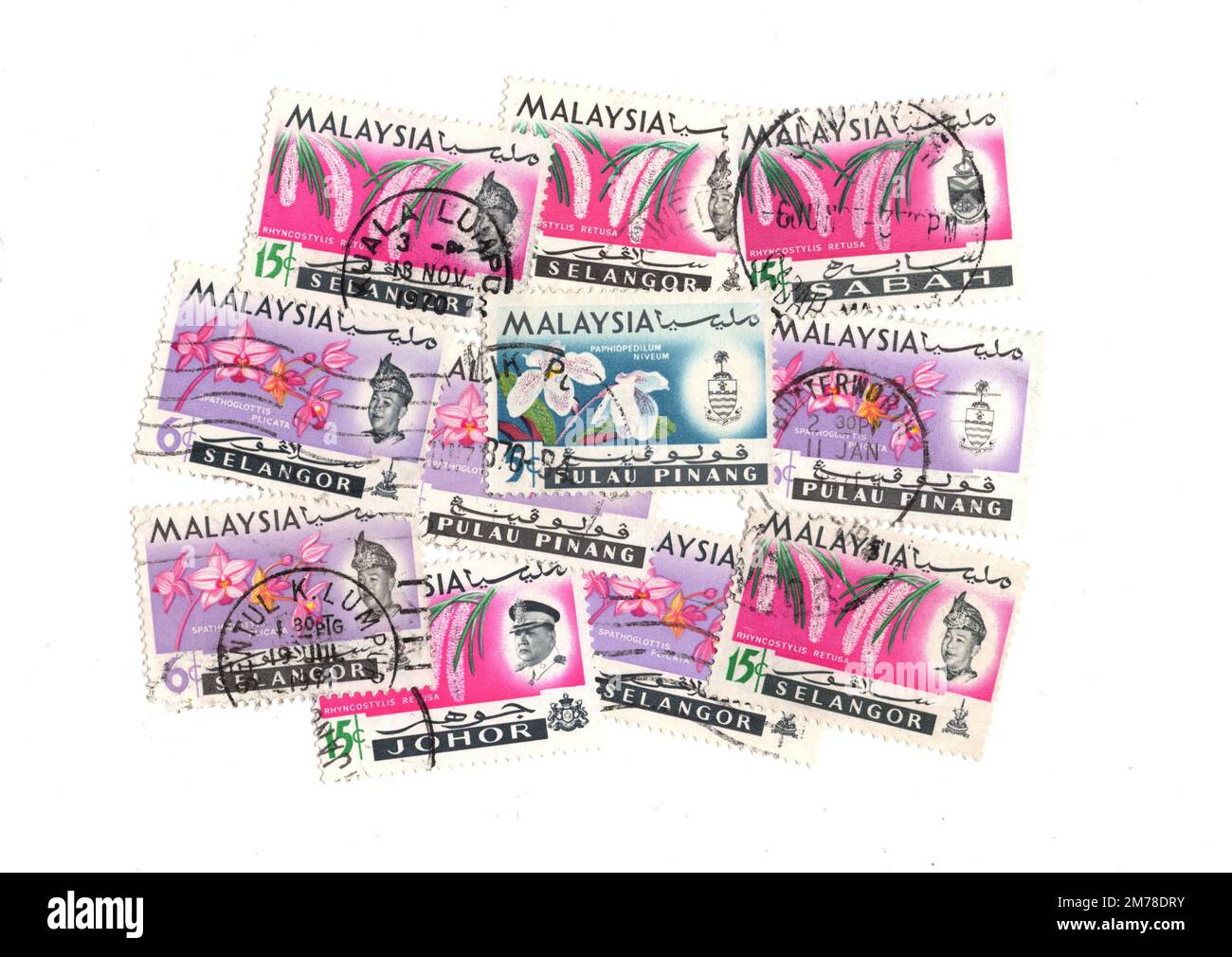 Vintage used postage stamps from Malaysia isolated on a white ...