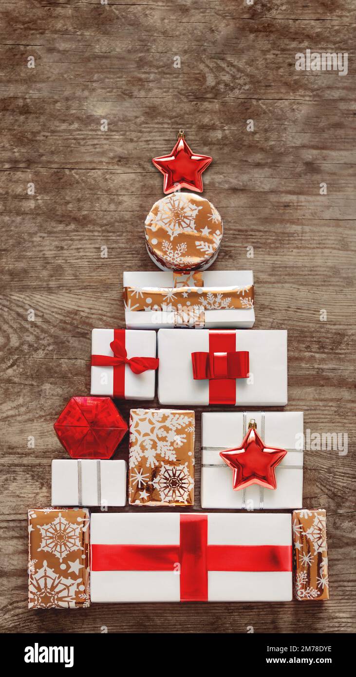 Top view on New Year presents in shape of Christmas tree on shabby ...