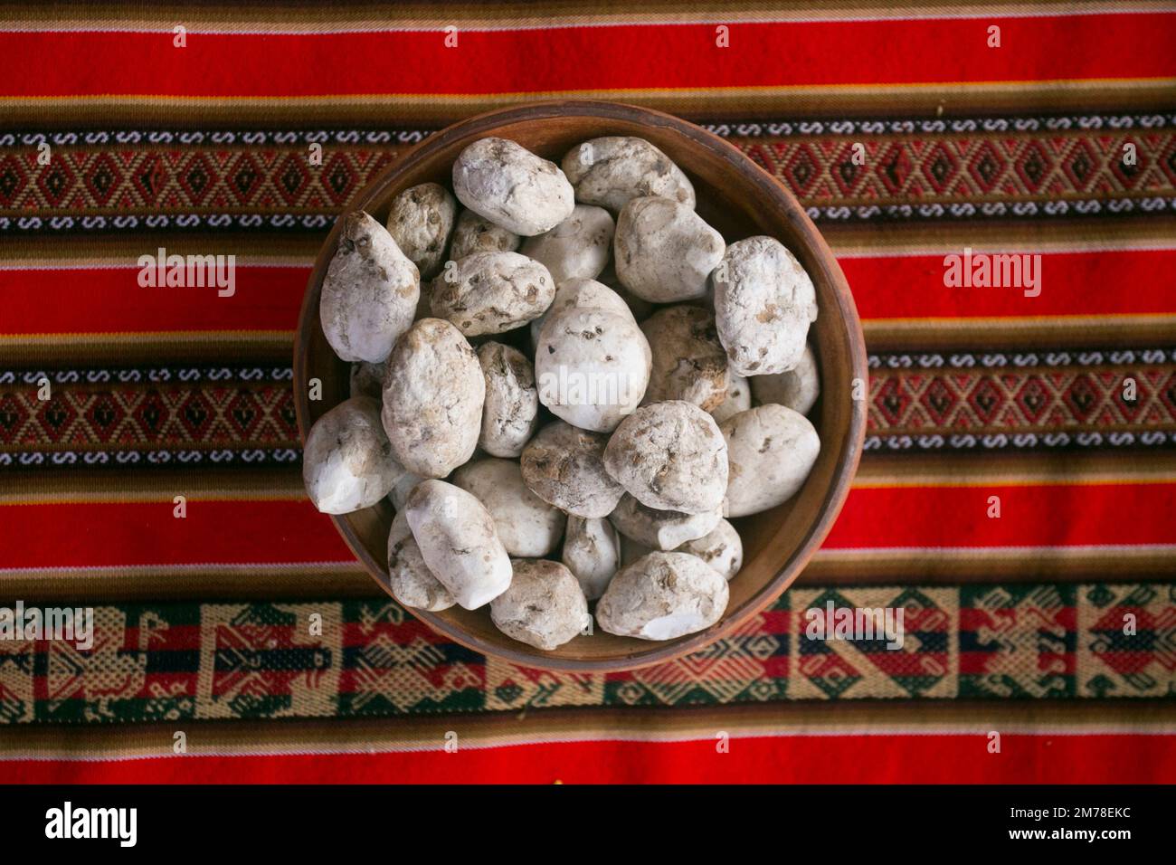 Chuño o papa milenaria. In the pachamanca ceremony, lamb, alpaca, pork ...