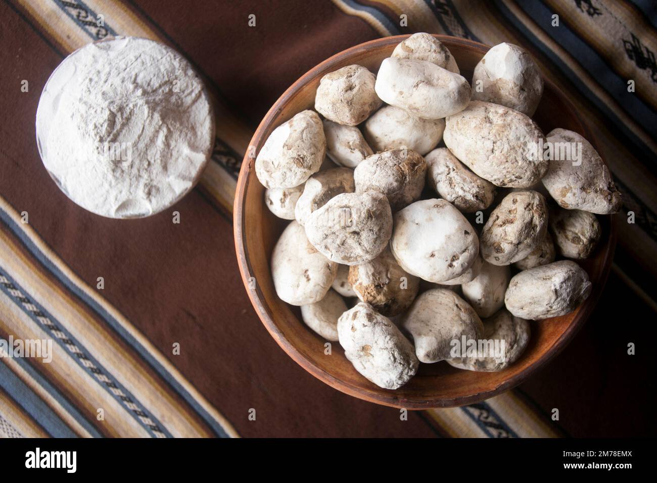 Chuño o papa milenaria. In the pachamanca ceremony, lamb, alpaca, pork ...