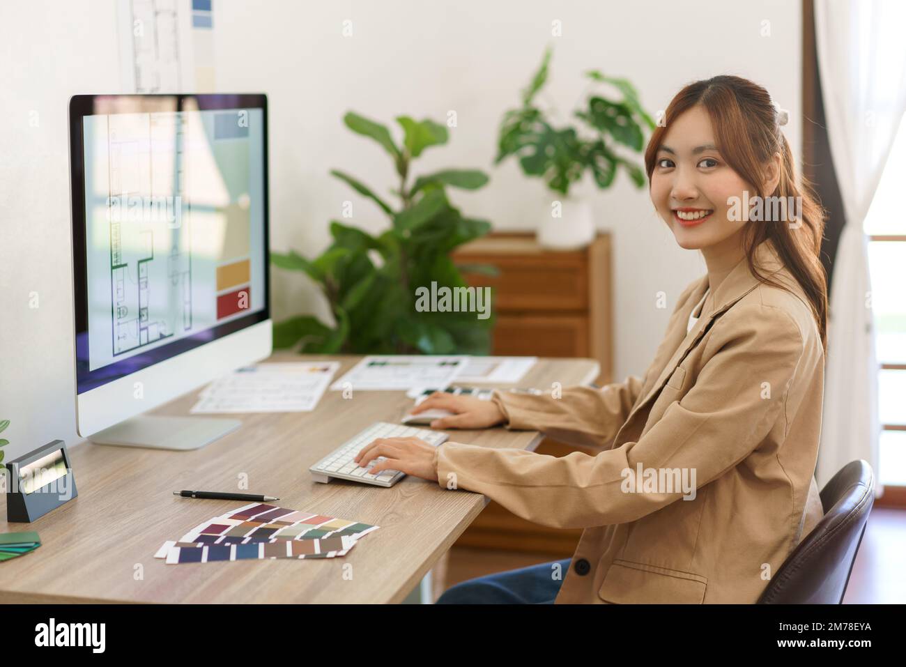 Architecture concept, Female architect working about designing house ...