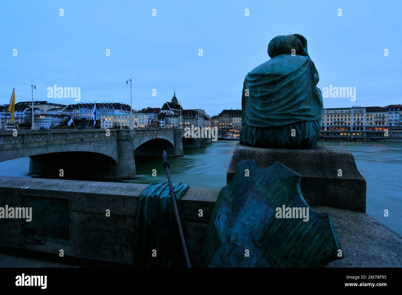 Dusk, the statue of Helvetia, Mittlere Brücke bridge, river Rhine, city ...