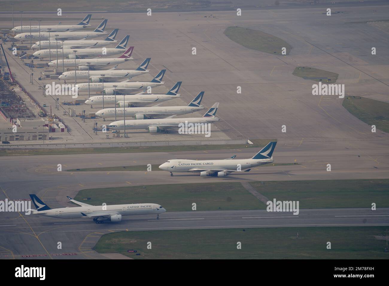 Cathay Pacific Airways and Cathay Dragon airplanes at the Hong Kong ...