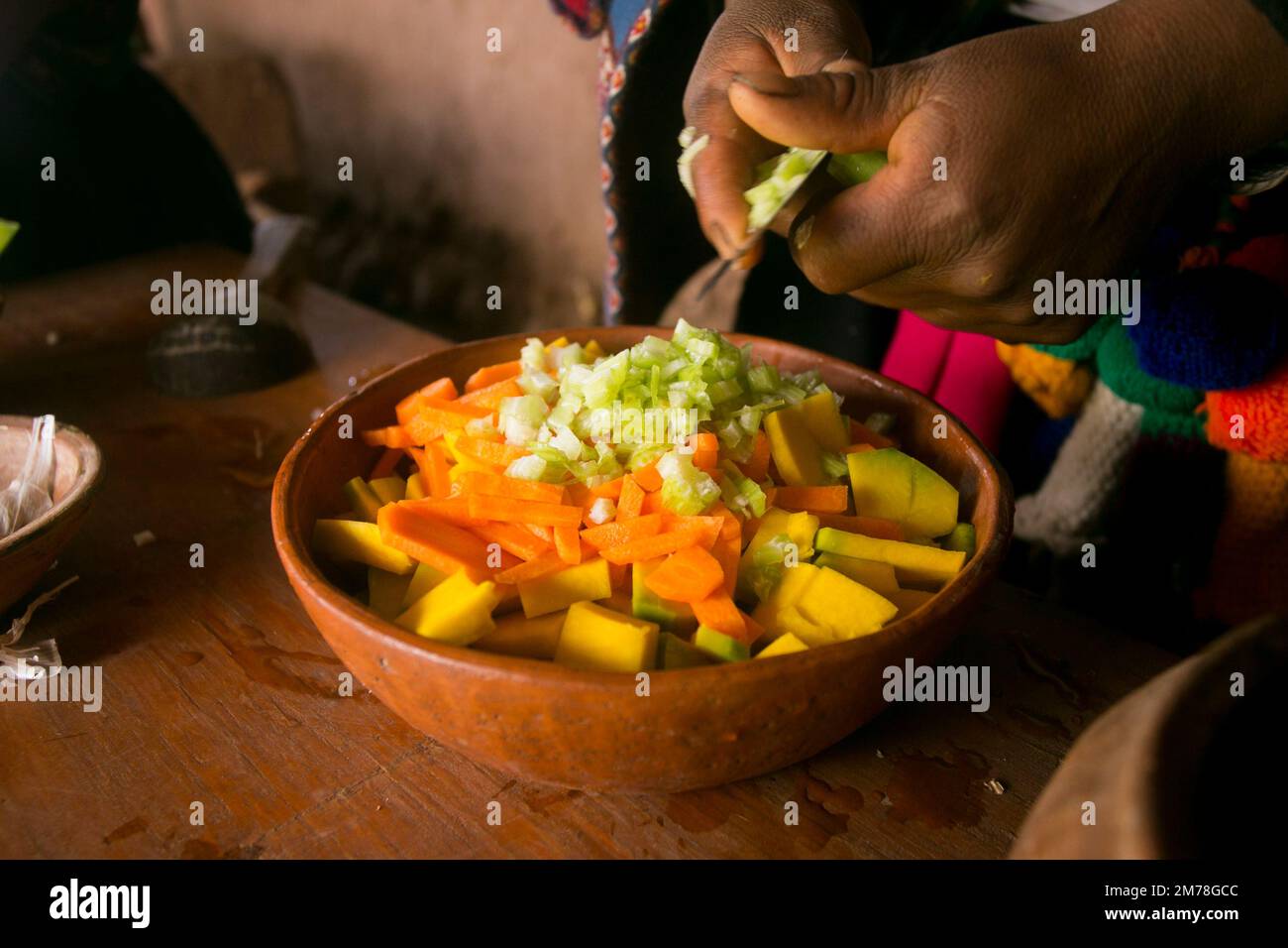 Cooking a traditional Andean vegetable soup before a Pachamanca feast ...