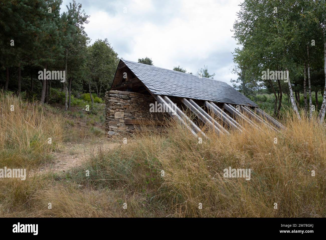 A rustic modern rest stop provides shelter and water for pilgrims along ...