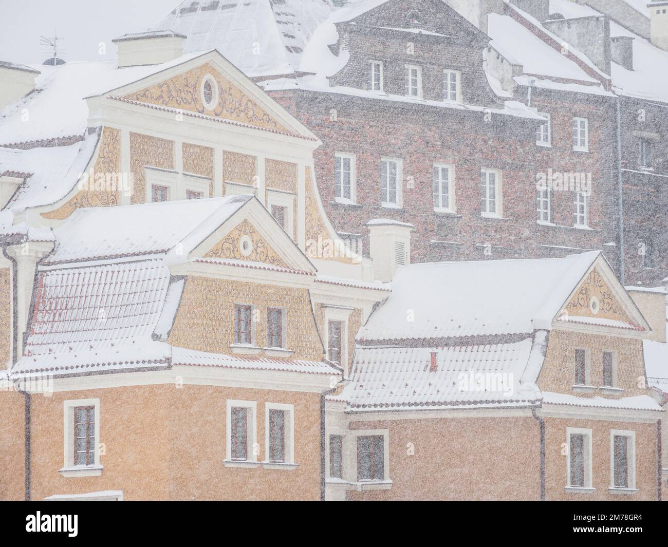 Attack of winter. Building on Old Town in fresh snow Stock Photo - Alamy