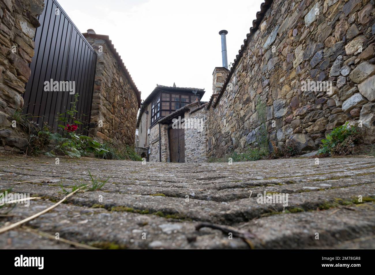 A narrow alleyway in the village of Rabanal del Camino along the Camino ...