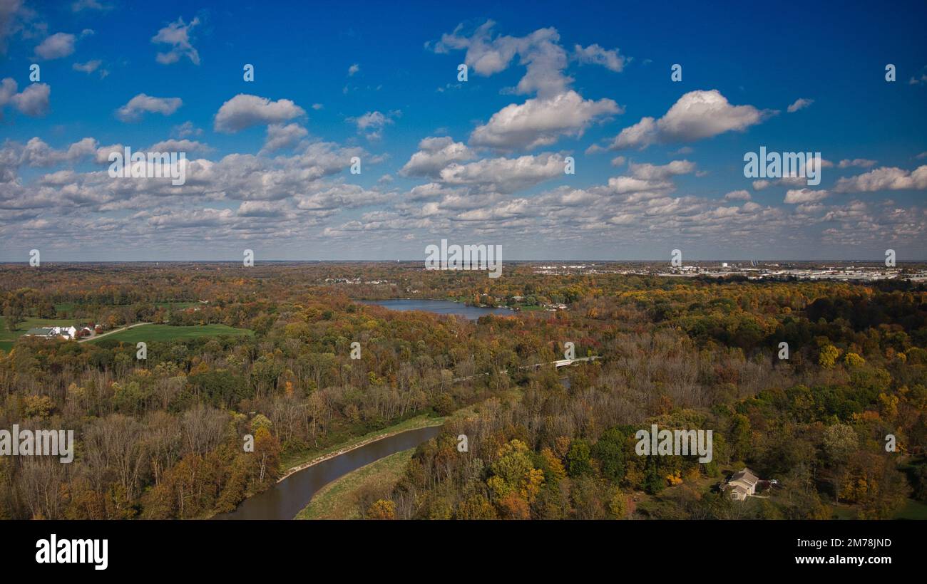 A top view of a beautiful natural scenery with a river flowing through ...