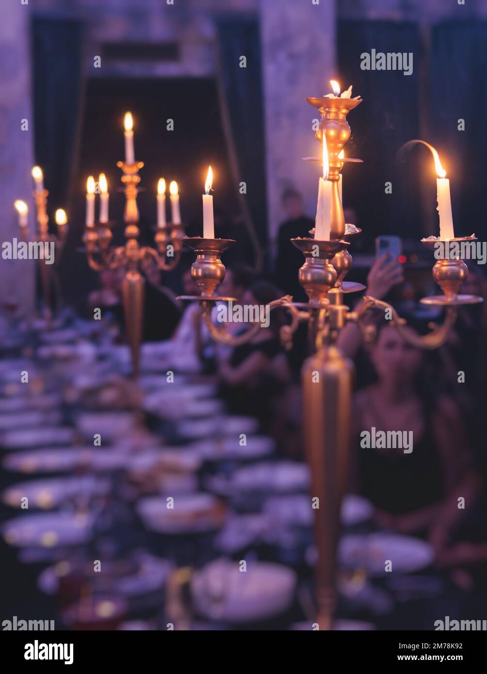 Vintage retro brass candlesticks with candles burning, luxury event ...