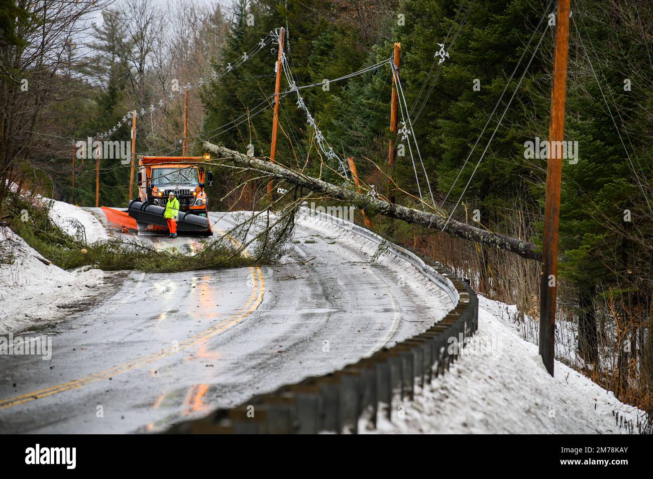 Road closed due to fallen tree on power line due to wind and rain storm ...