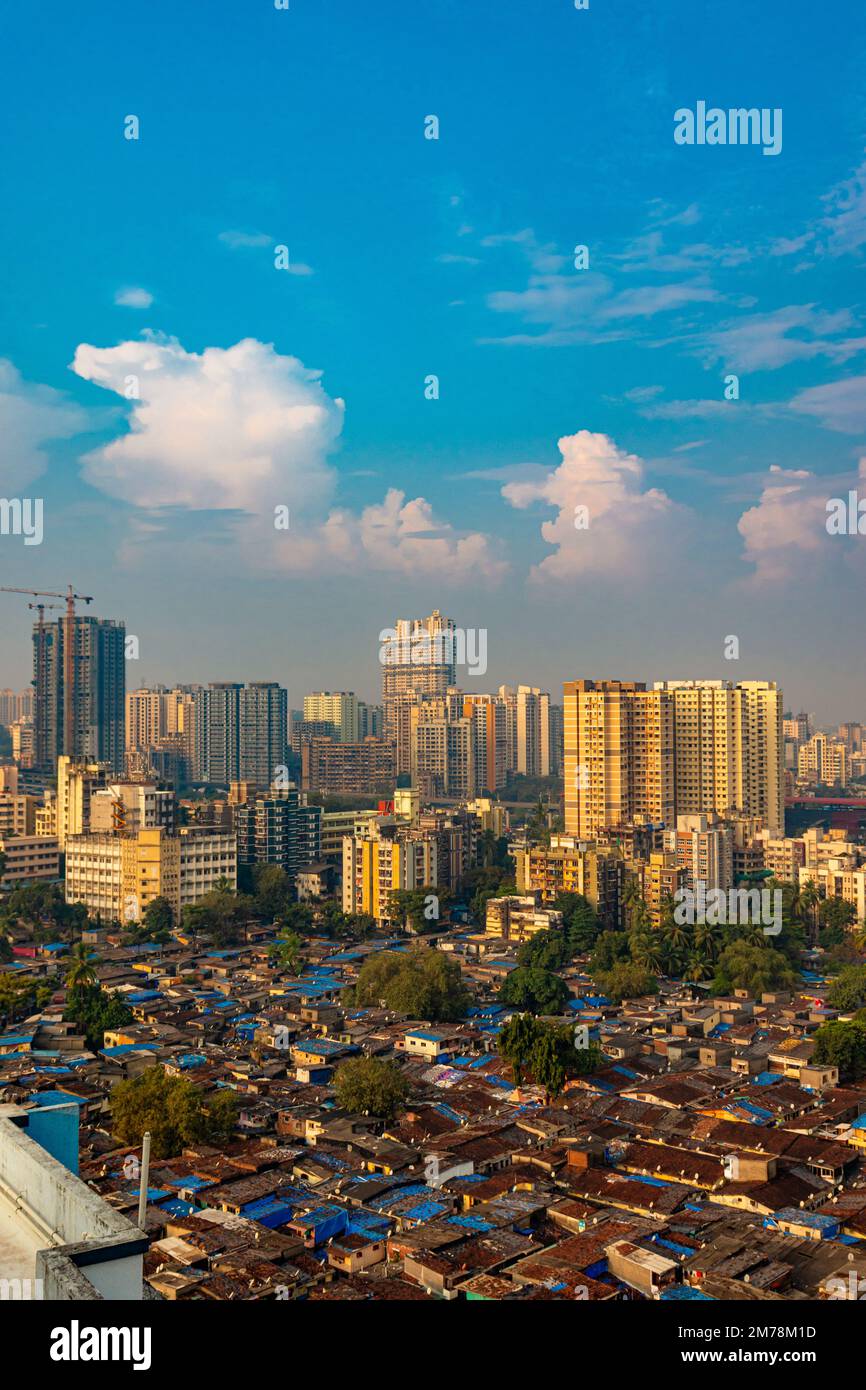 A vertical aerial view of modern buildings and houses in Mumbai, India ...