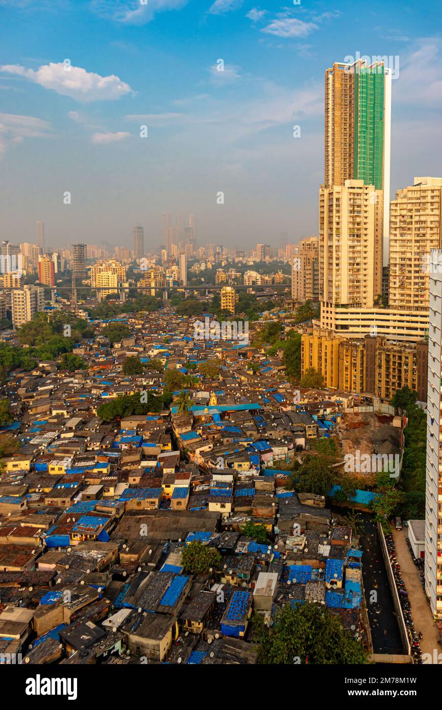 A vertical aerial view of modern buildings and houses in Mumbai, India ...