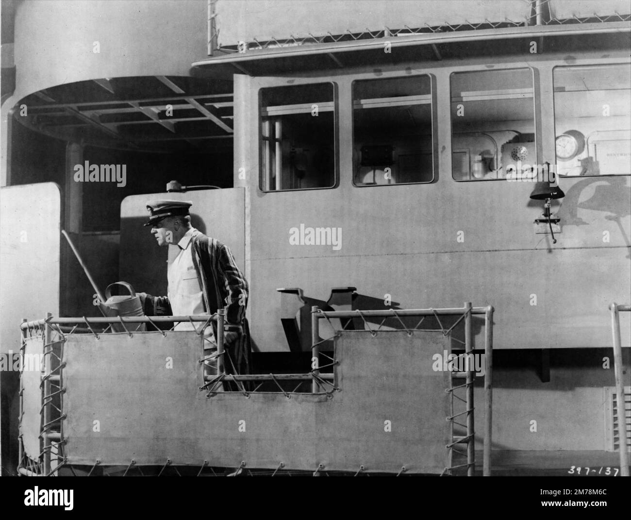 JAMES CAGNEY as the Captain watering his plants in MISTER ROBERTS 1955 ...