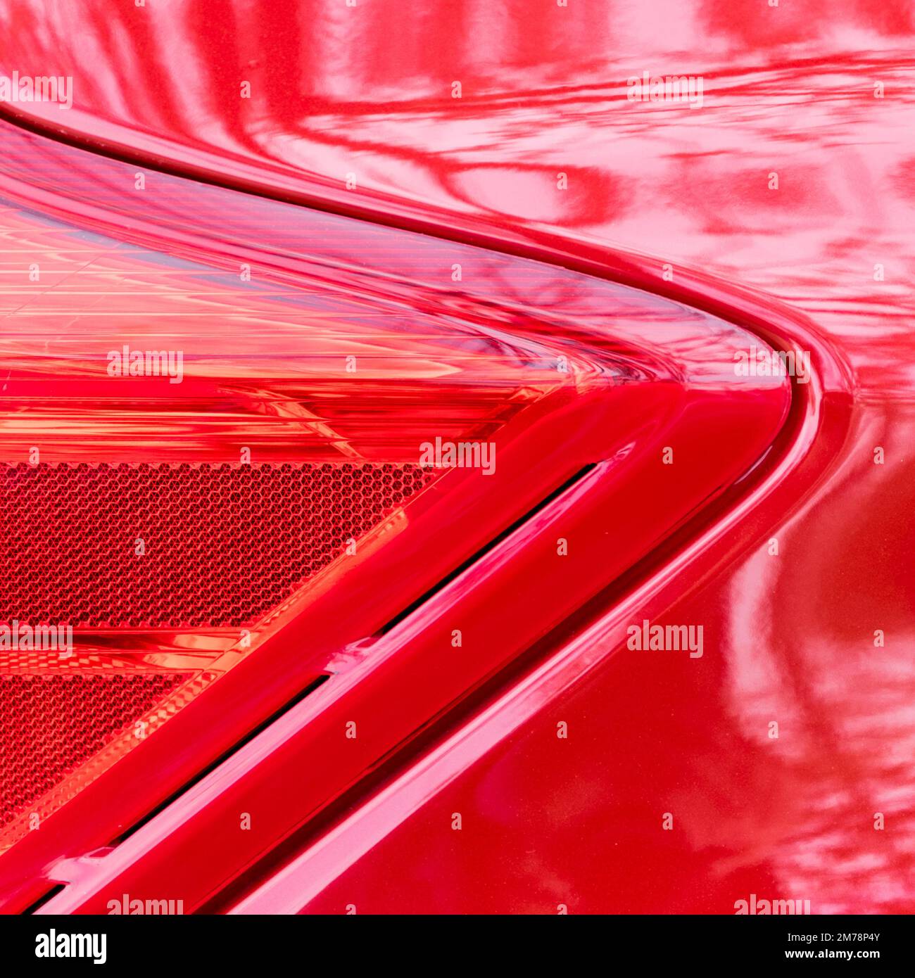Details of the geometric shape of the signal light of a red car and its ...
