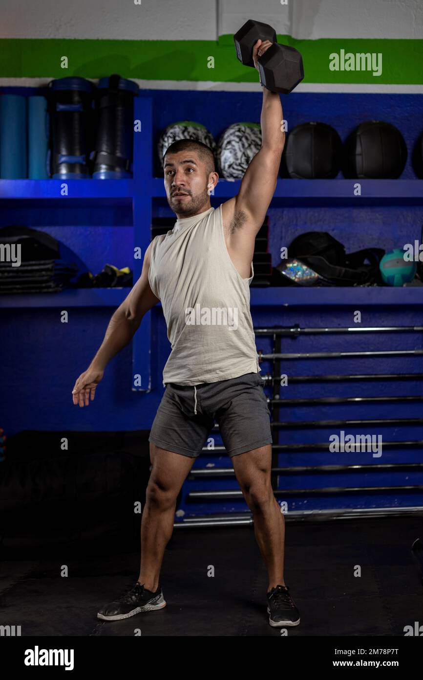 Dumbbell lifts hi-res stock photography and images - Alamy
