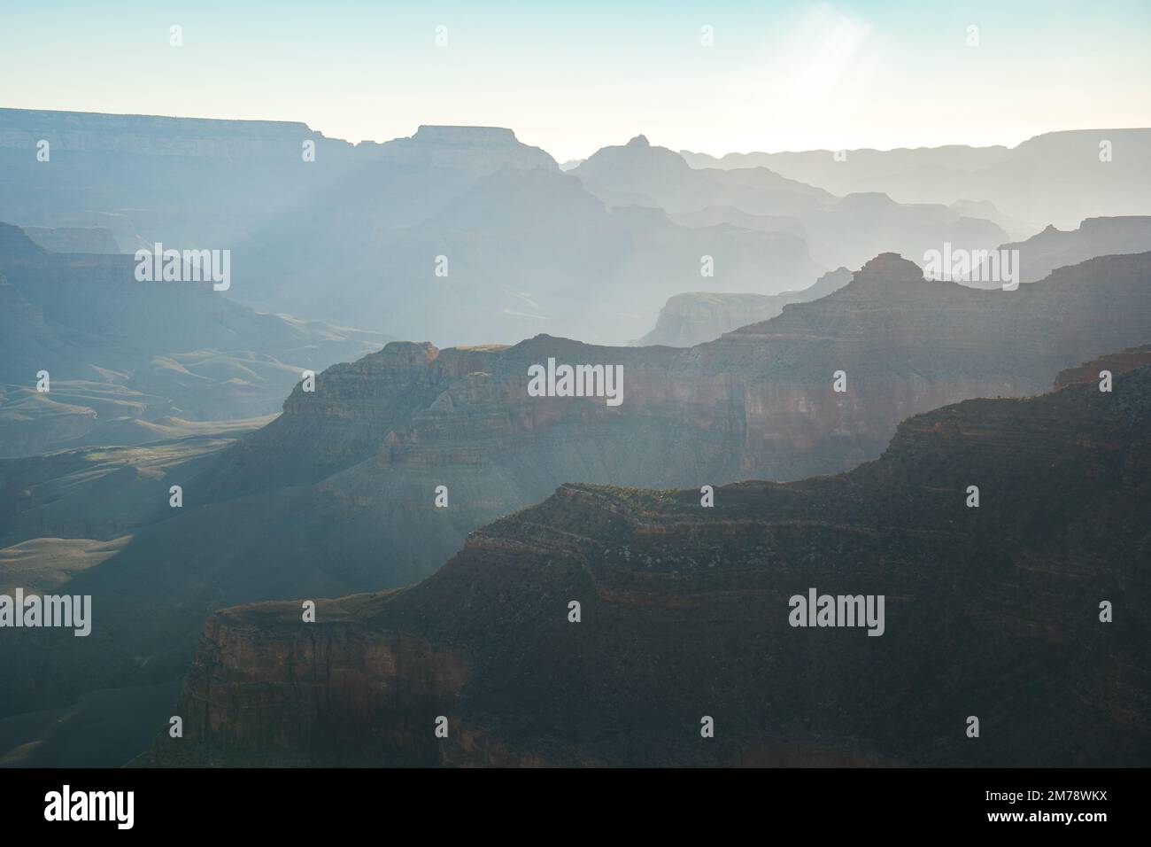 sun rays over grand canyon national park Stock Photo - Alamy