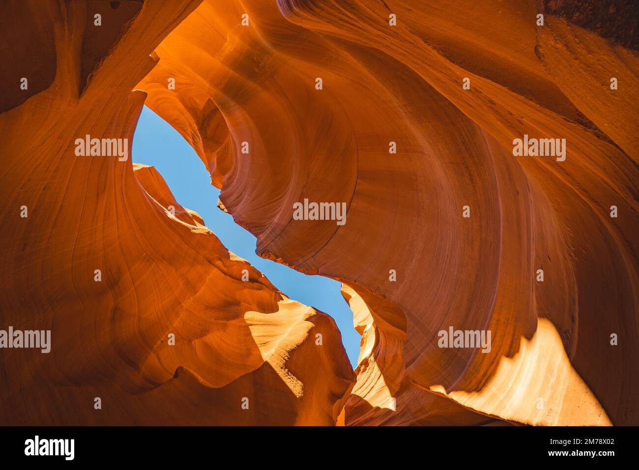 looking up the antelope canyon illuminated in orange color Stock Photo ...