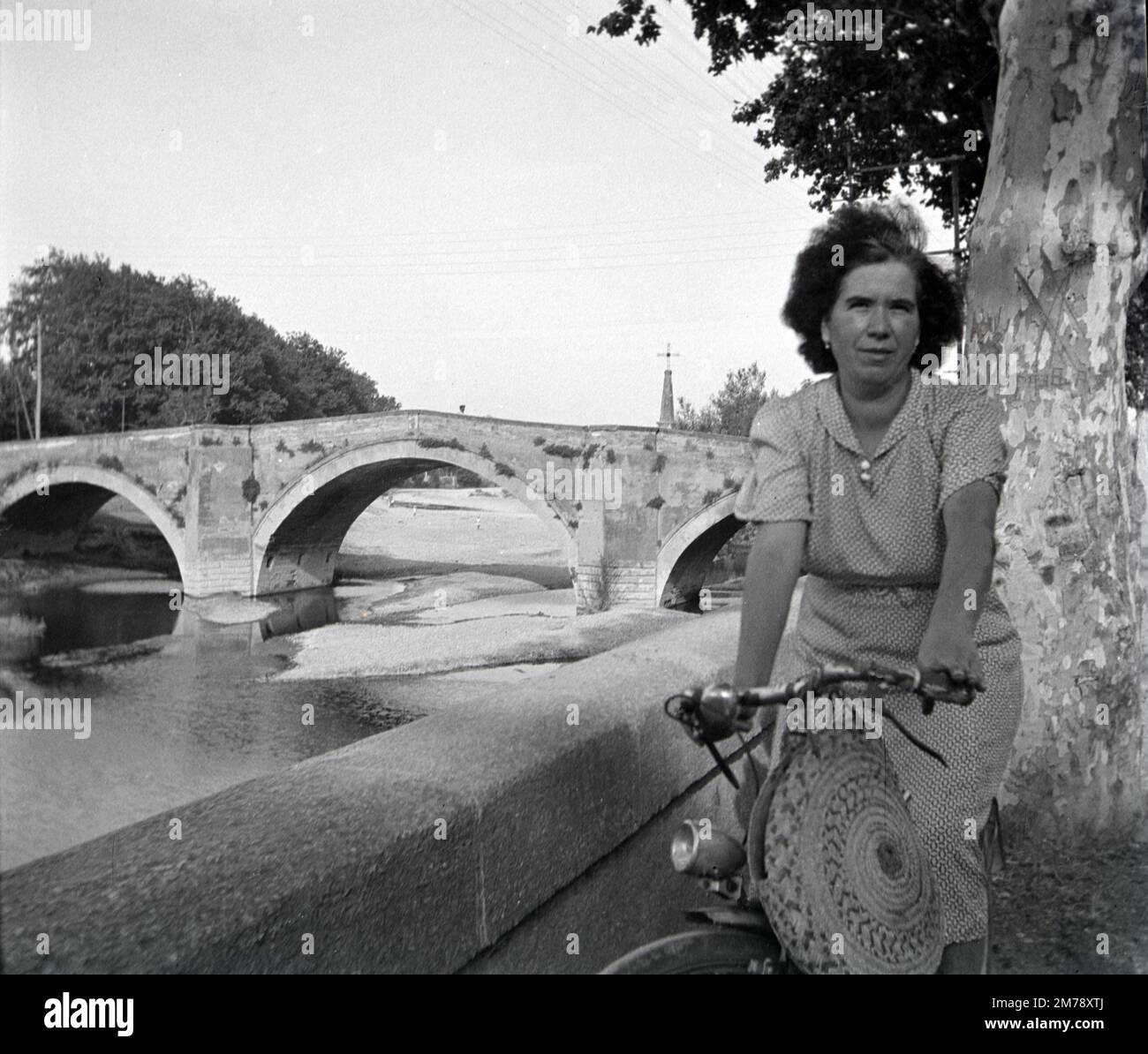 1940s Female Cyclist Poses next to Bedarrides Bridge Vaucluse Provence ...