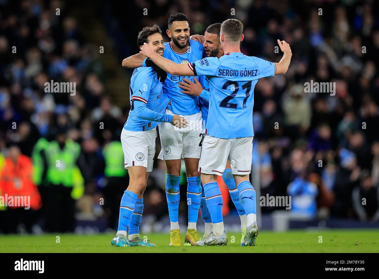 Riyad Mahrez #26 of Manchester City celebrates his goal with his team ...