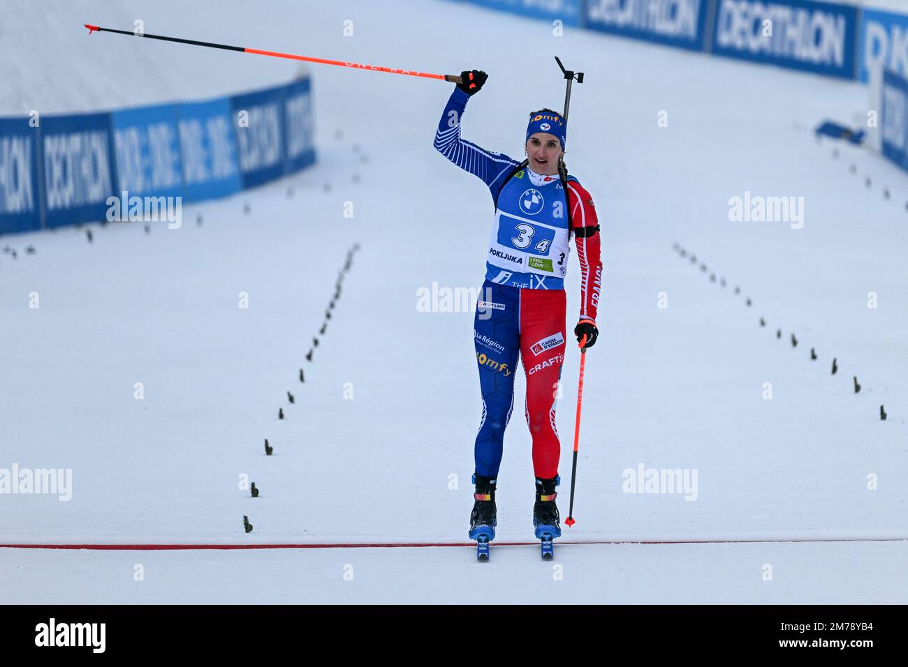 Julia Simon of France crosses the finish line during the Mixed Relay ...