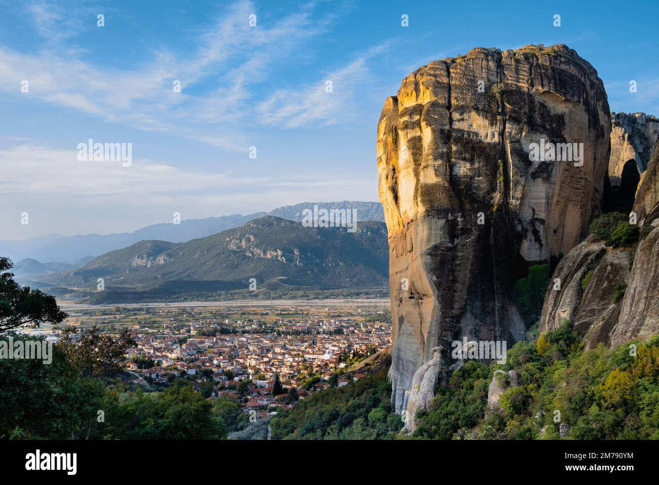 An aerial view of the historic Meteora Rocks and a view of Kalampaka ...