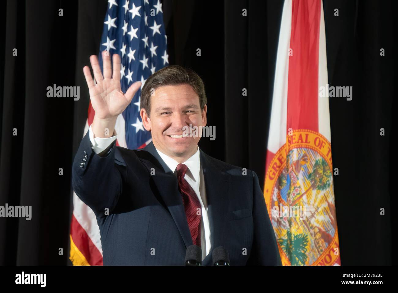 Gov. Ron DeSantis waves to the audience at a Freedom Blueprint ...