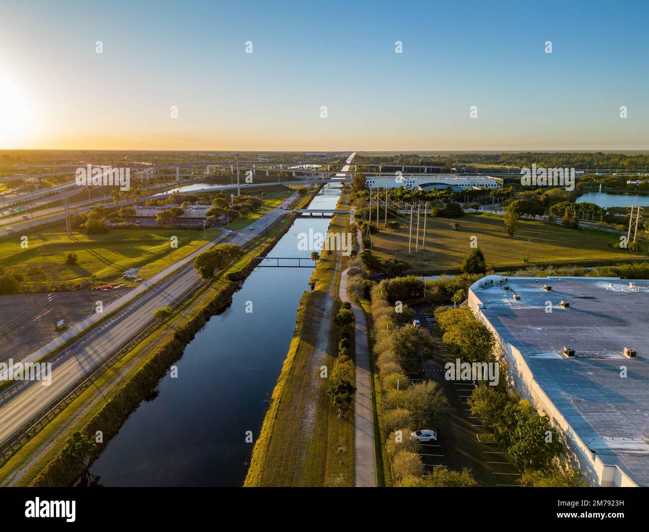 Aerial photo SR 84 and the New River Greenway bike path at sunset Stock ...