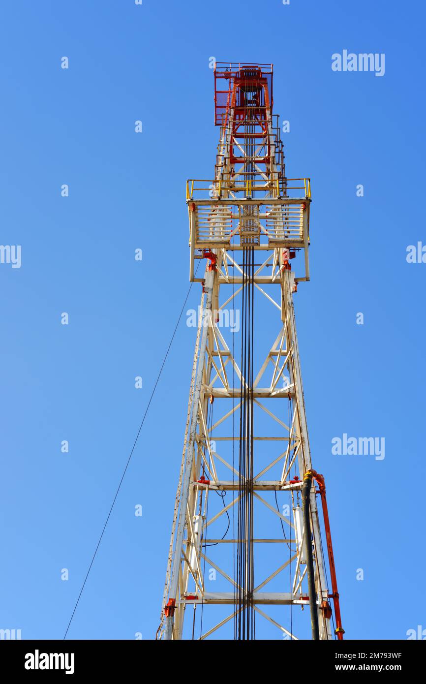 Oil Drilling rig and clear blue sky at the background Stock Photo - Alamy