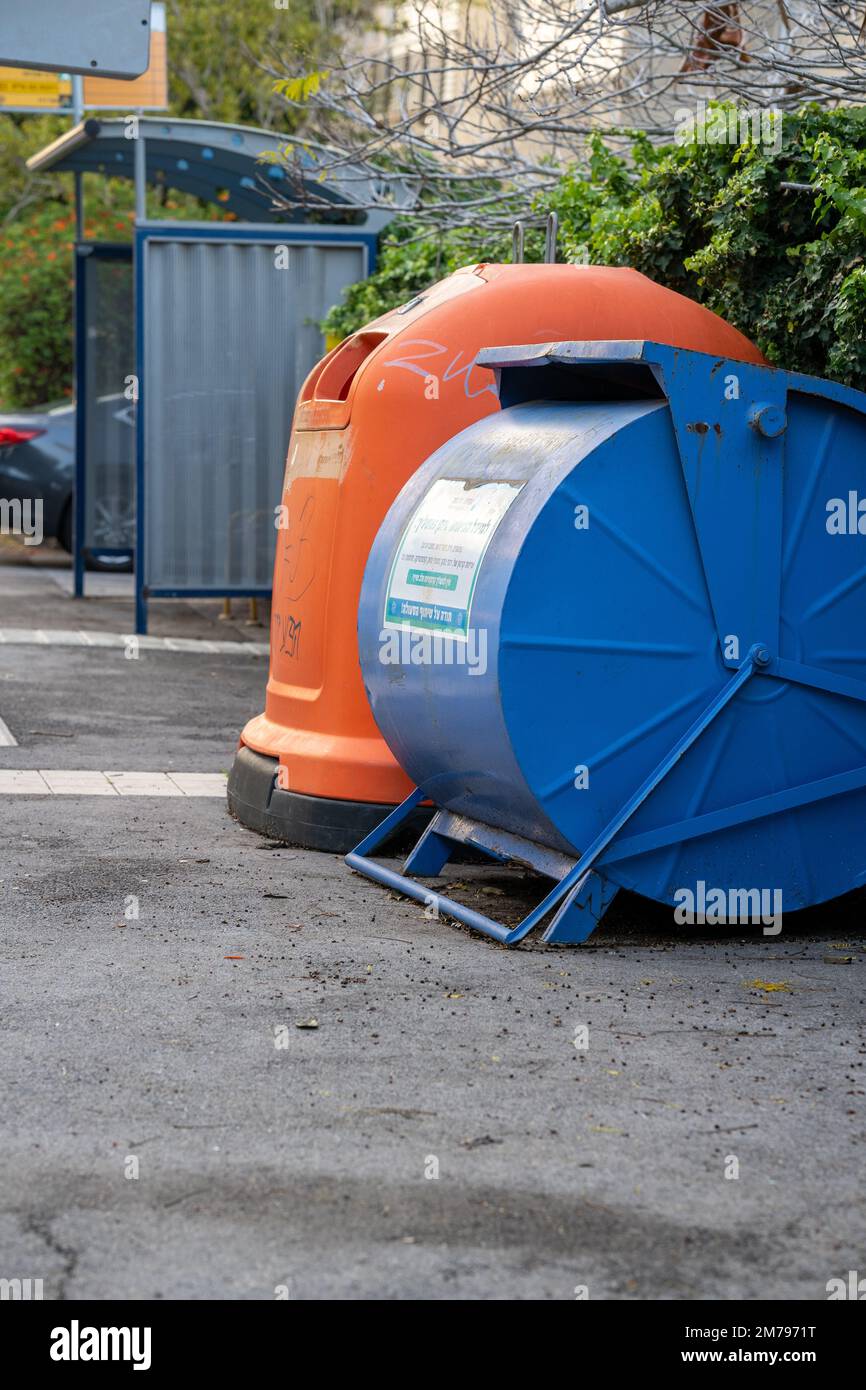 Haifa Israel jan 08 2023: different Recycling bins containers and a bus ...