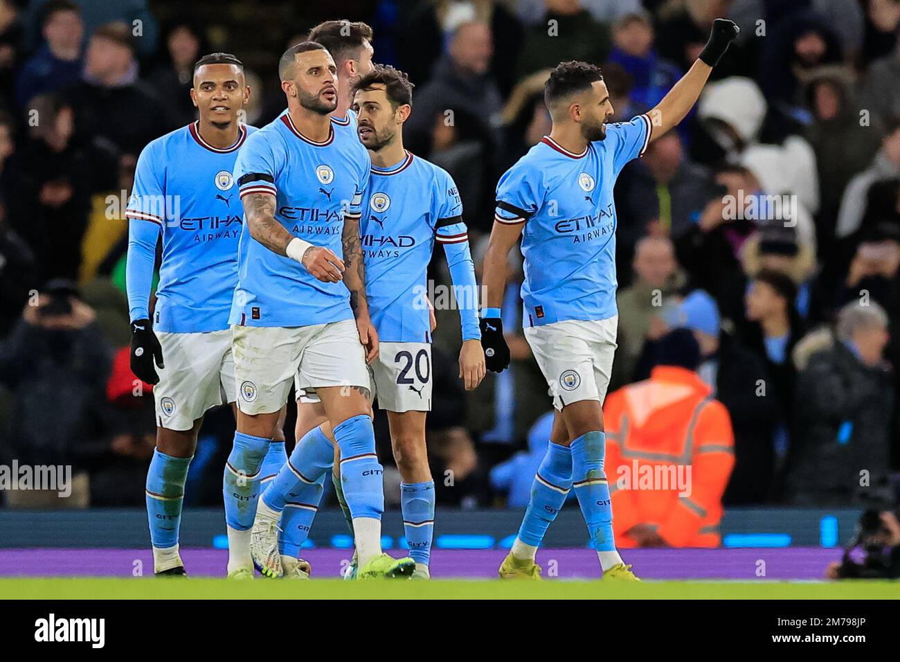Riyad Mahrez #26 of Manchester City celebrates his goal with his team ...