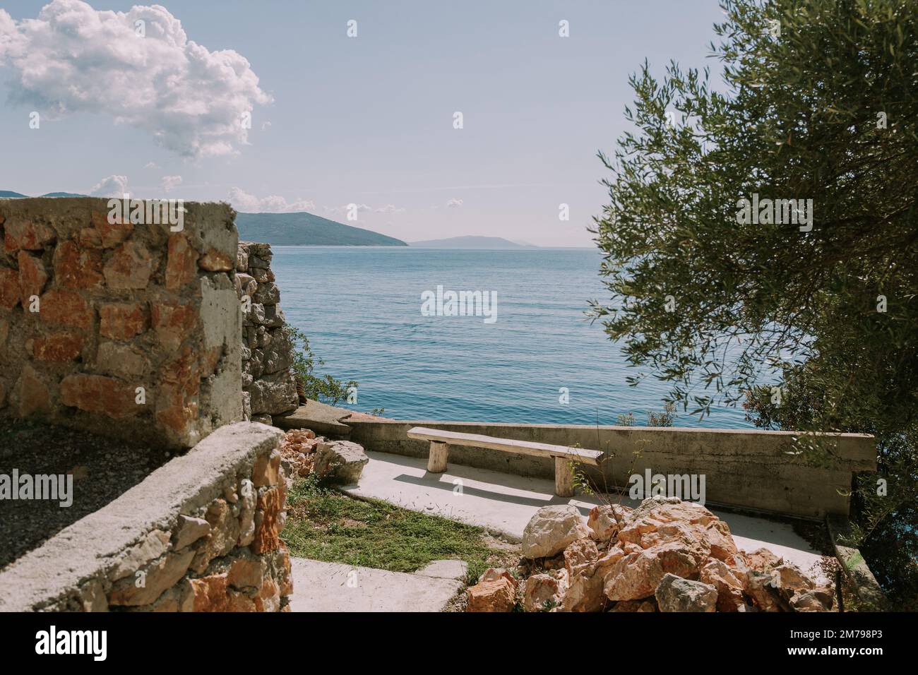 Summer coastline near an island on the deep blue ocean Stock Photo - Alamy