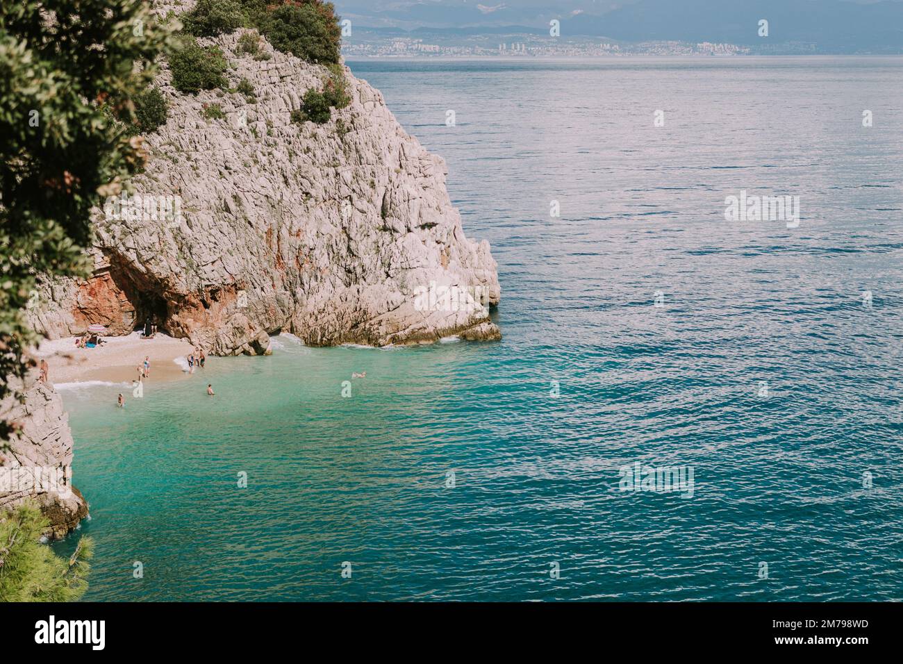 Summer coastline near an island on the deep blue ocean Stock Photo - Alamy