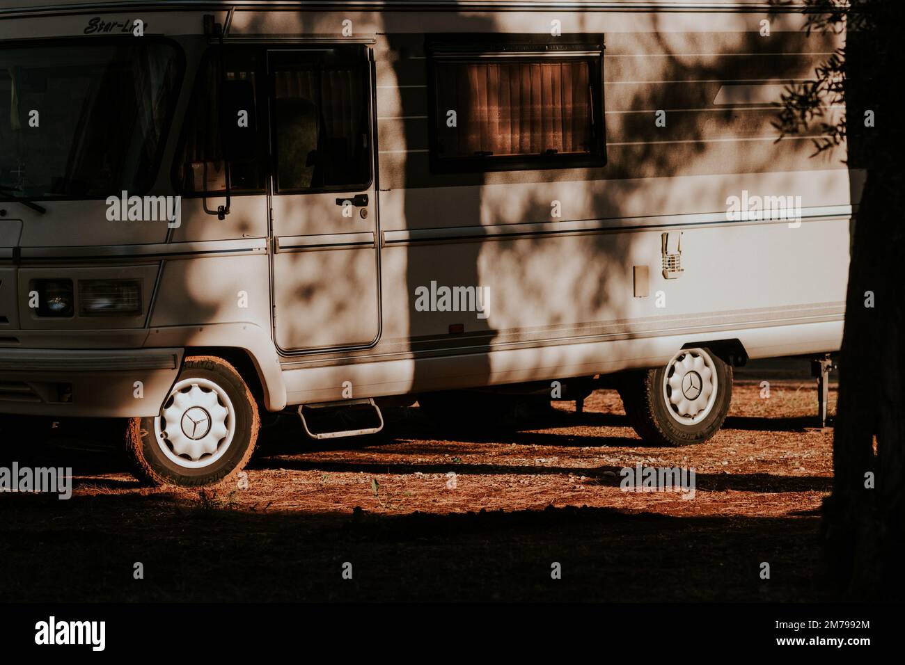 Camping in the summer near a RV van Stock Photo - Alamy