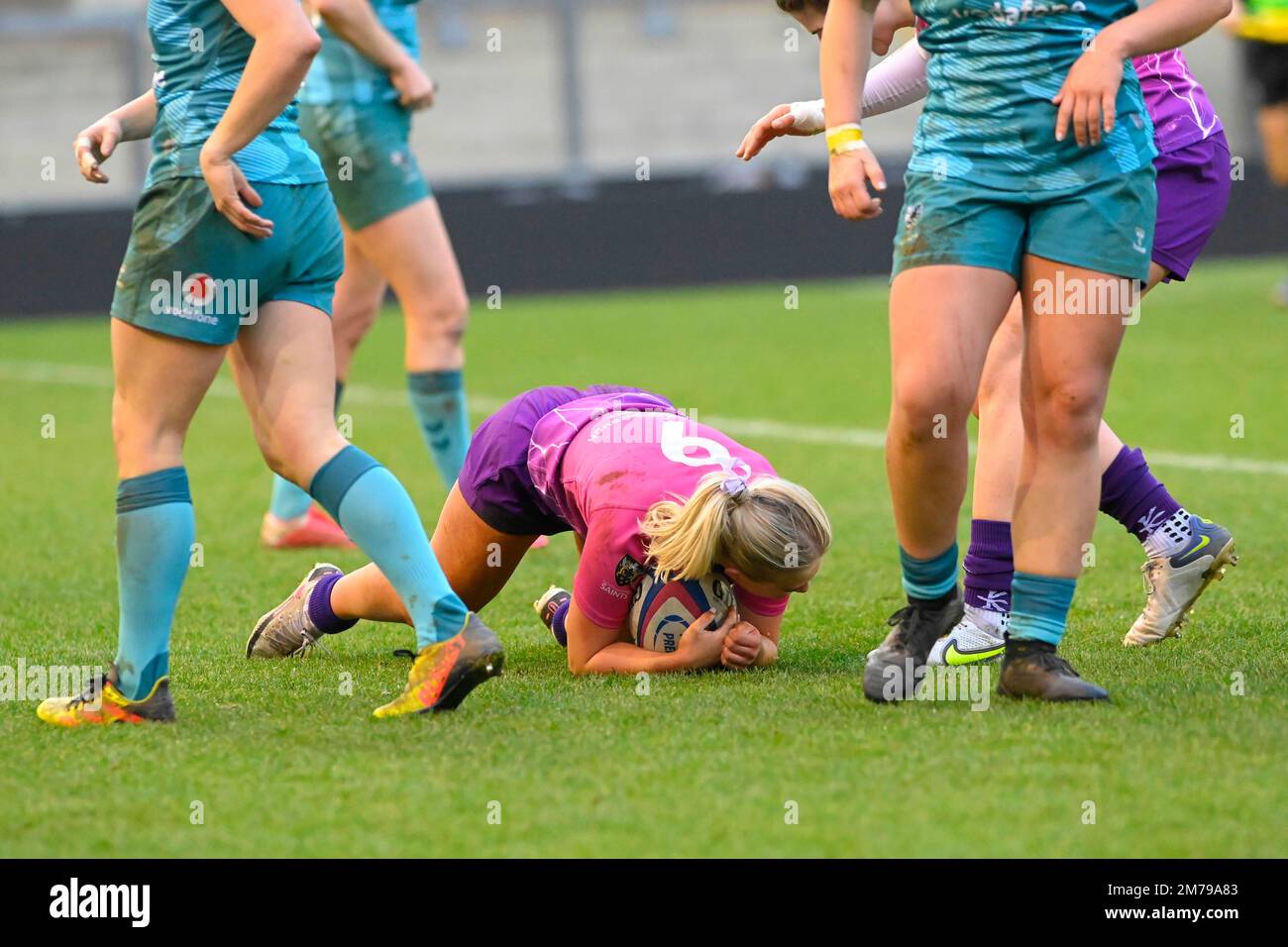 NORTHAMPTON, ENGLAND : Jess Weaver of Loughborough Lightning gets a try ...