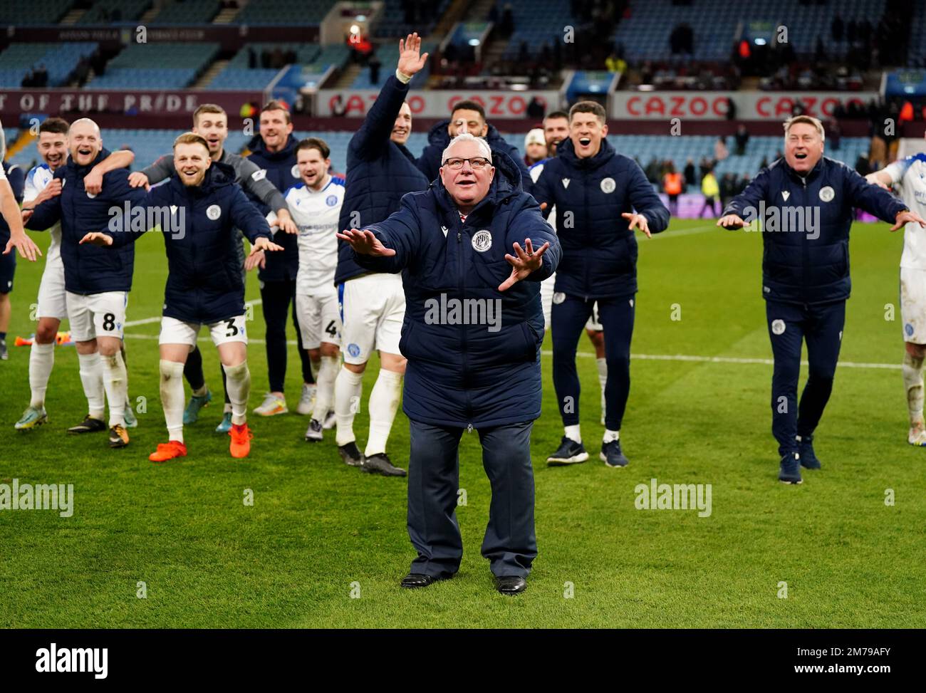 Stevenage manager Steve Evans and the team celebrate the win after the ...