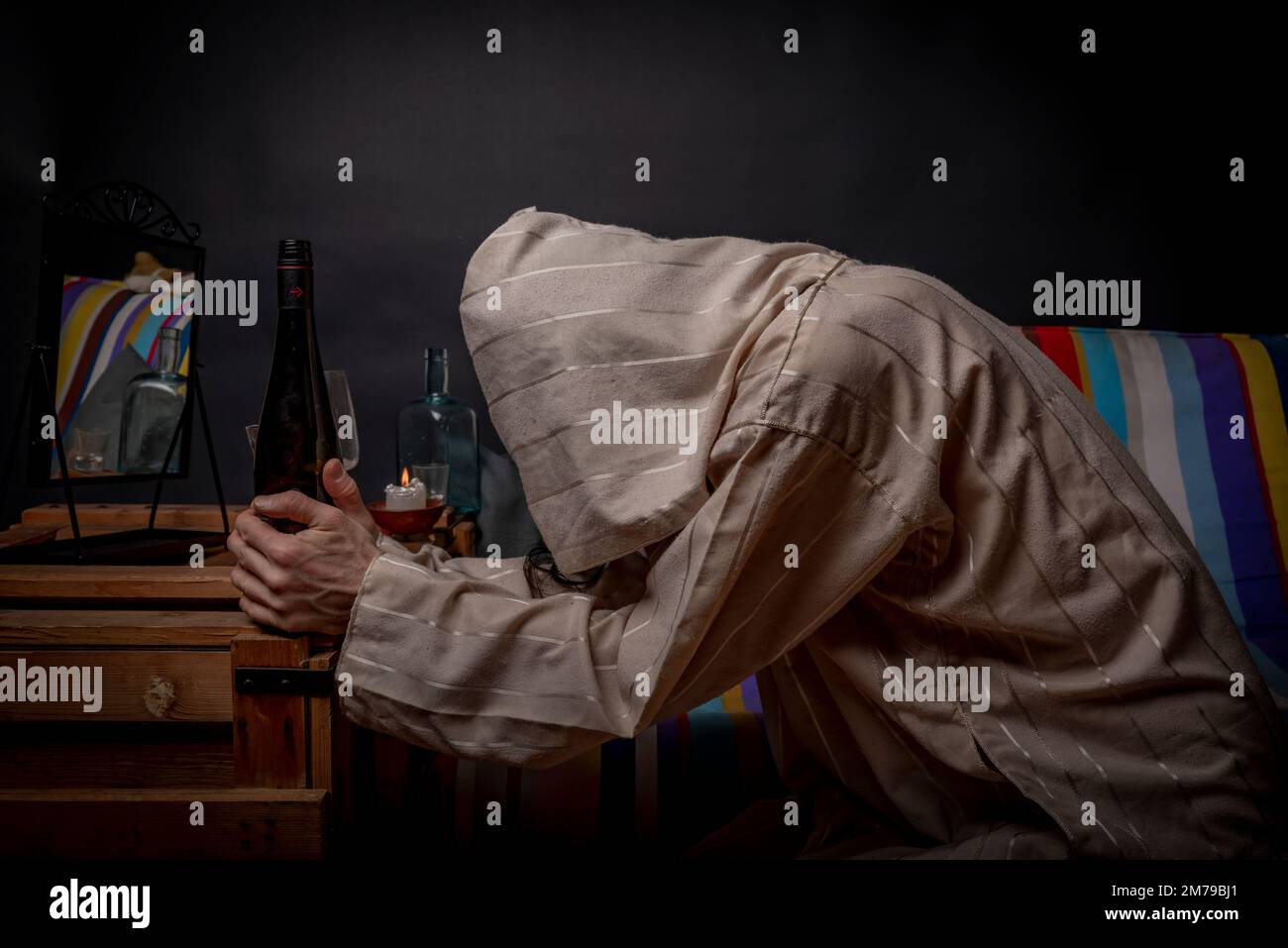 Person with candle in dark house hi-res stock photography and images ...