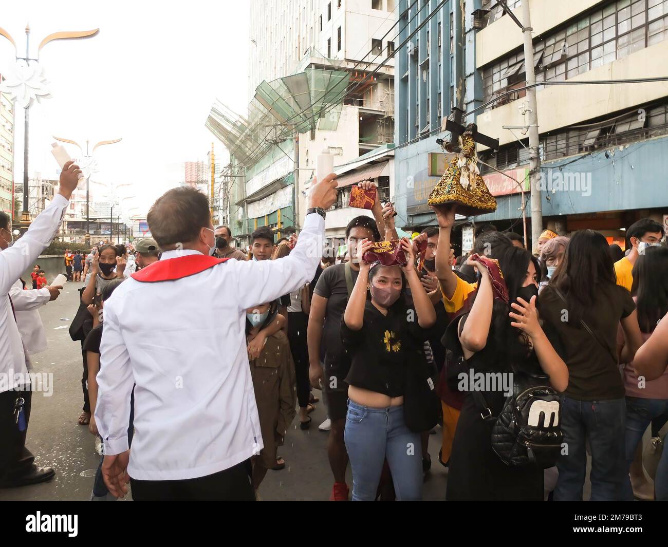Quiapo Church Lay Ministers bless the devotees replicas and ...