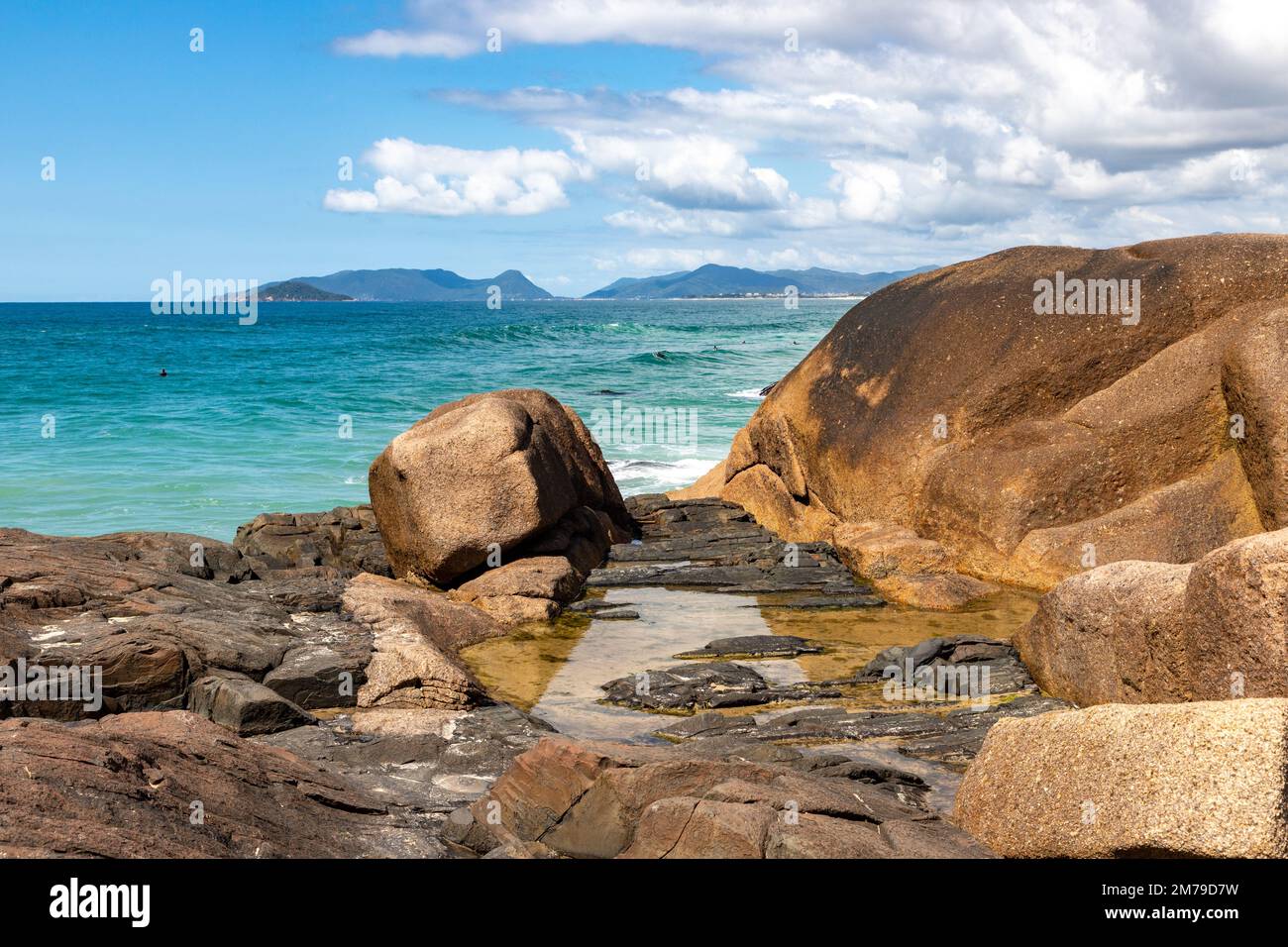 Rocks and waves at Joaquina beach, Florianopolis, Santa Catarina ...