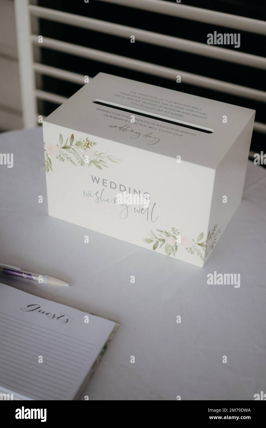 A white wood box for cards at the wedding reception Stock Photo - Alamy