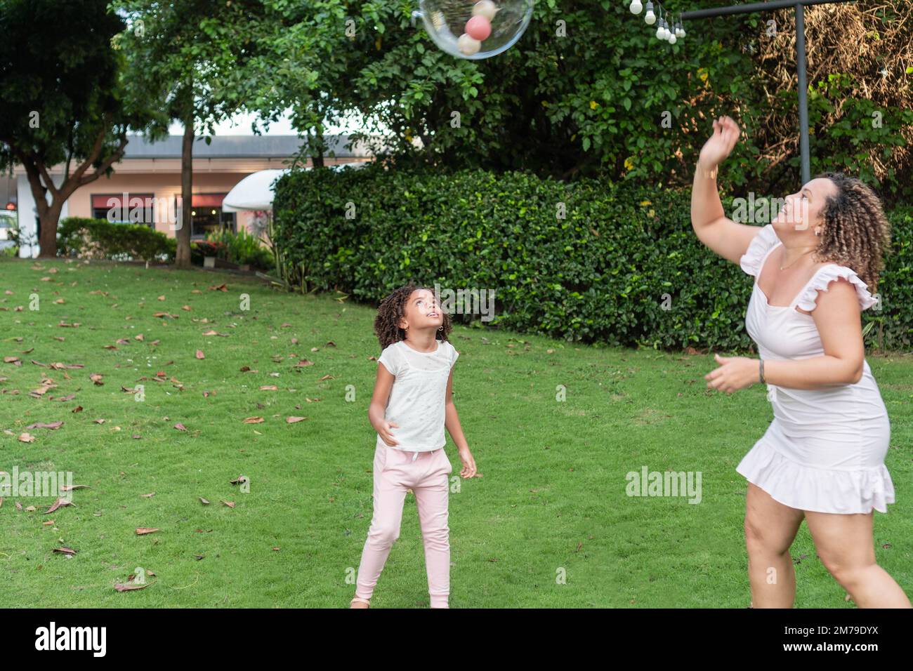 Latin family playing ball hi-res stock photography and images - Alamy