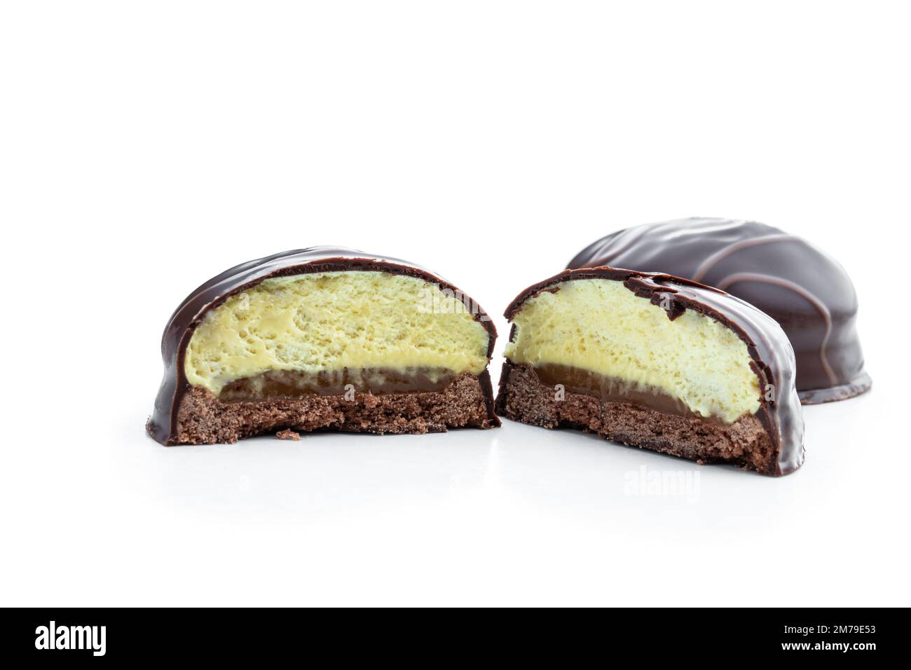 Chocolate covered cookie with pear souffle isolated on white Stock ...