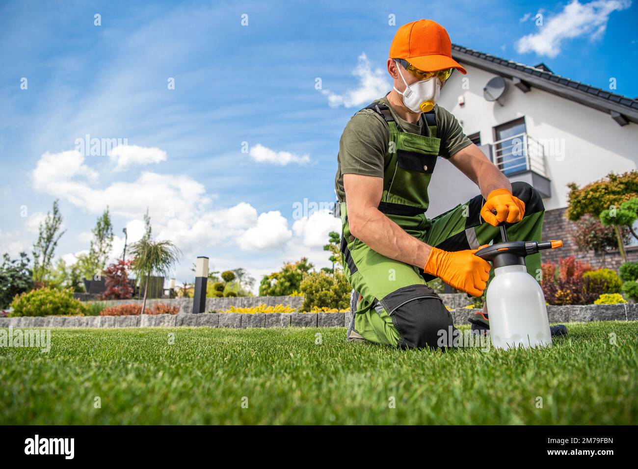 Professional Gardener Wearing Full Face Mask and Safety Glasses Getting ...