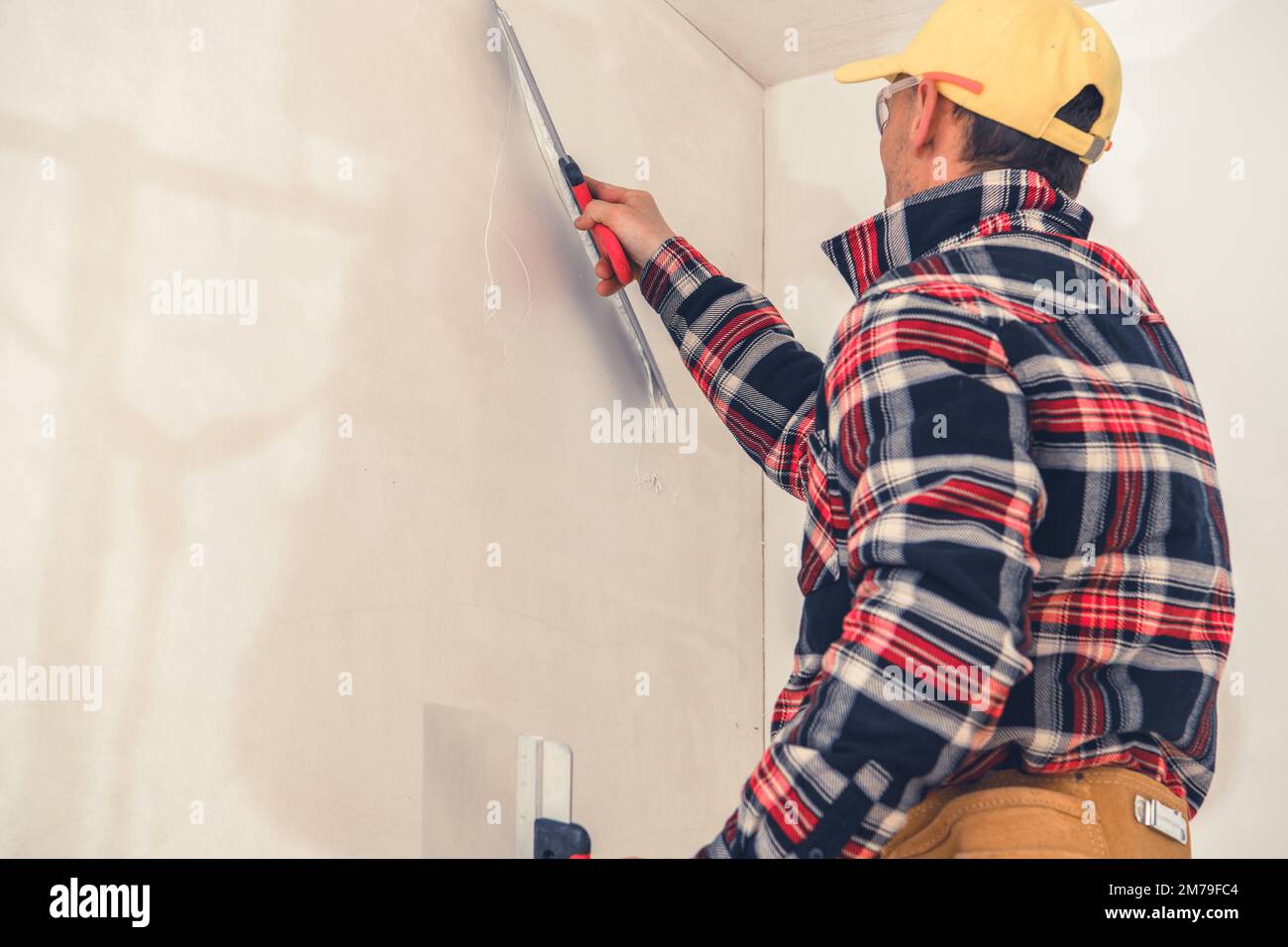 Professional Caucasian Plasterer in Checkered Shirt Plastering Interior ...
