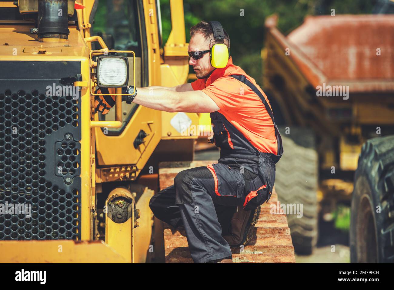 Professional Caucasian Mechanic Inspecting Heavy Duty Industrial ...