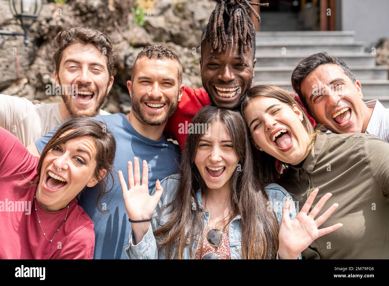 A group of multiethnic friends have the time of their lives on vacation ...