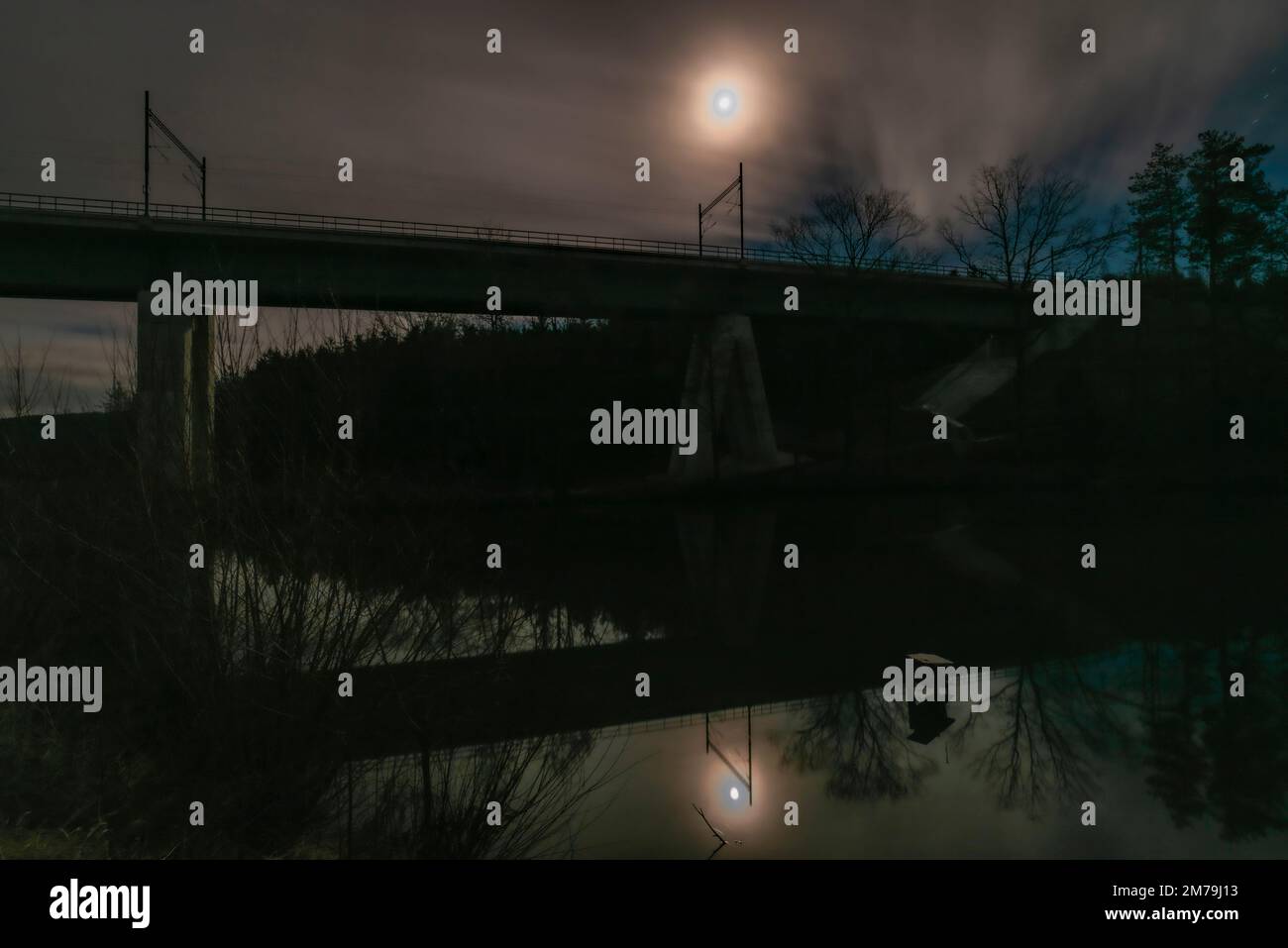 New railway bridge with moon and night sky near Hermanicky village in ...