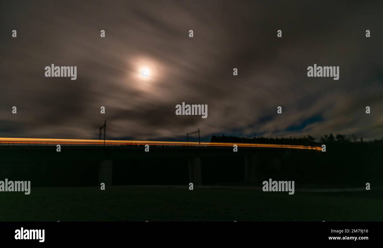 New railway bridge with moon and night sky near Hermanicky village in ...
