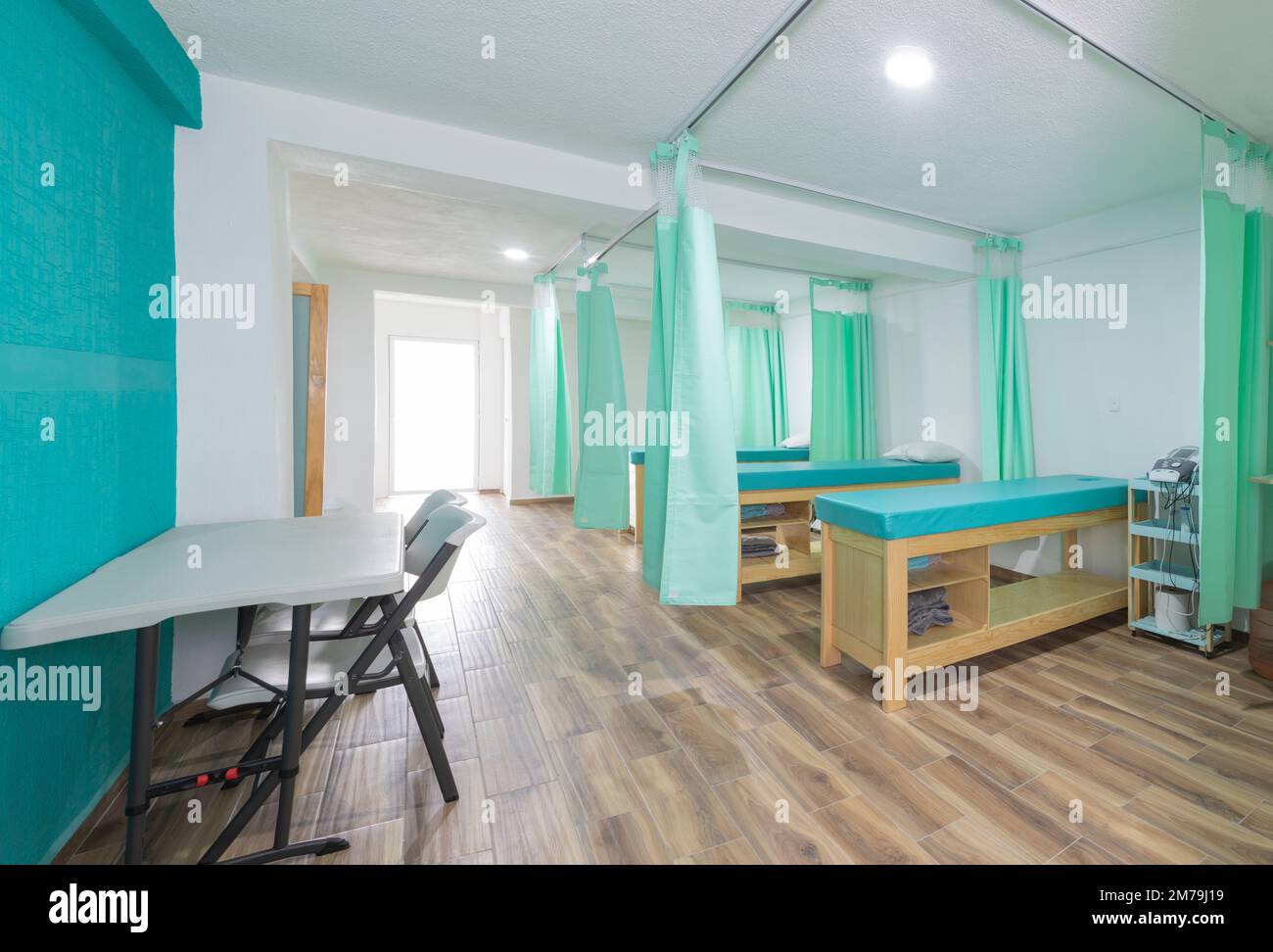 Stretchers with curtains in a rehabilitation clinic, without people ...