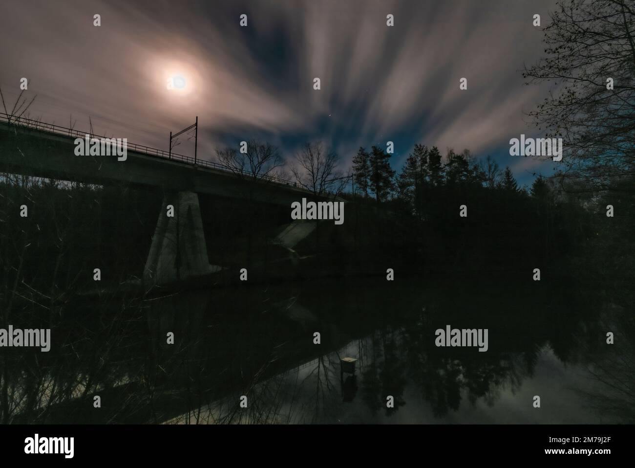 New railway bridge with moon and night sky near Hermanicky village in ...